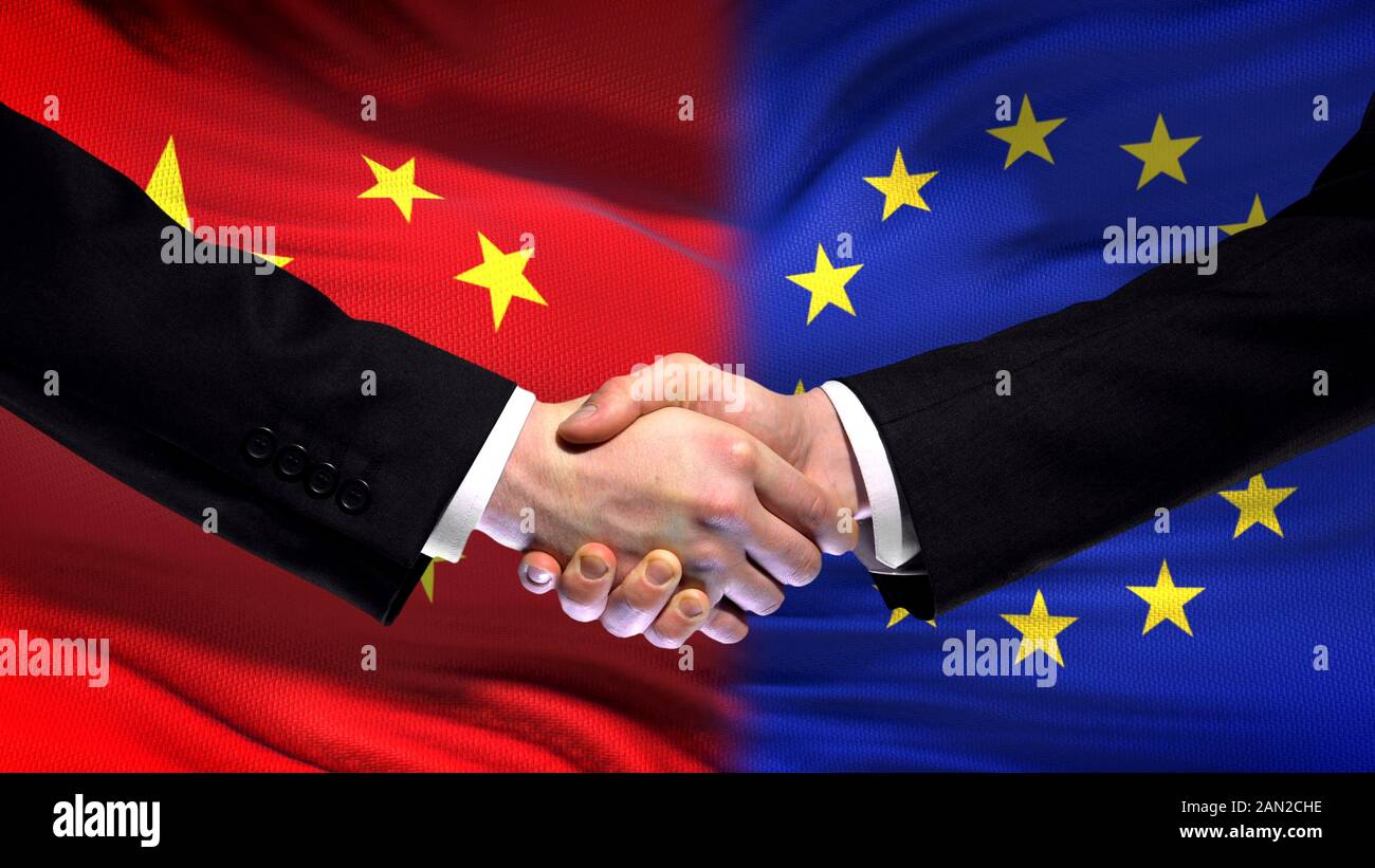 China and European Union handshake, international friendship, flag ...