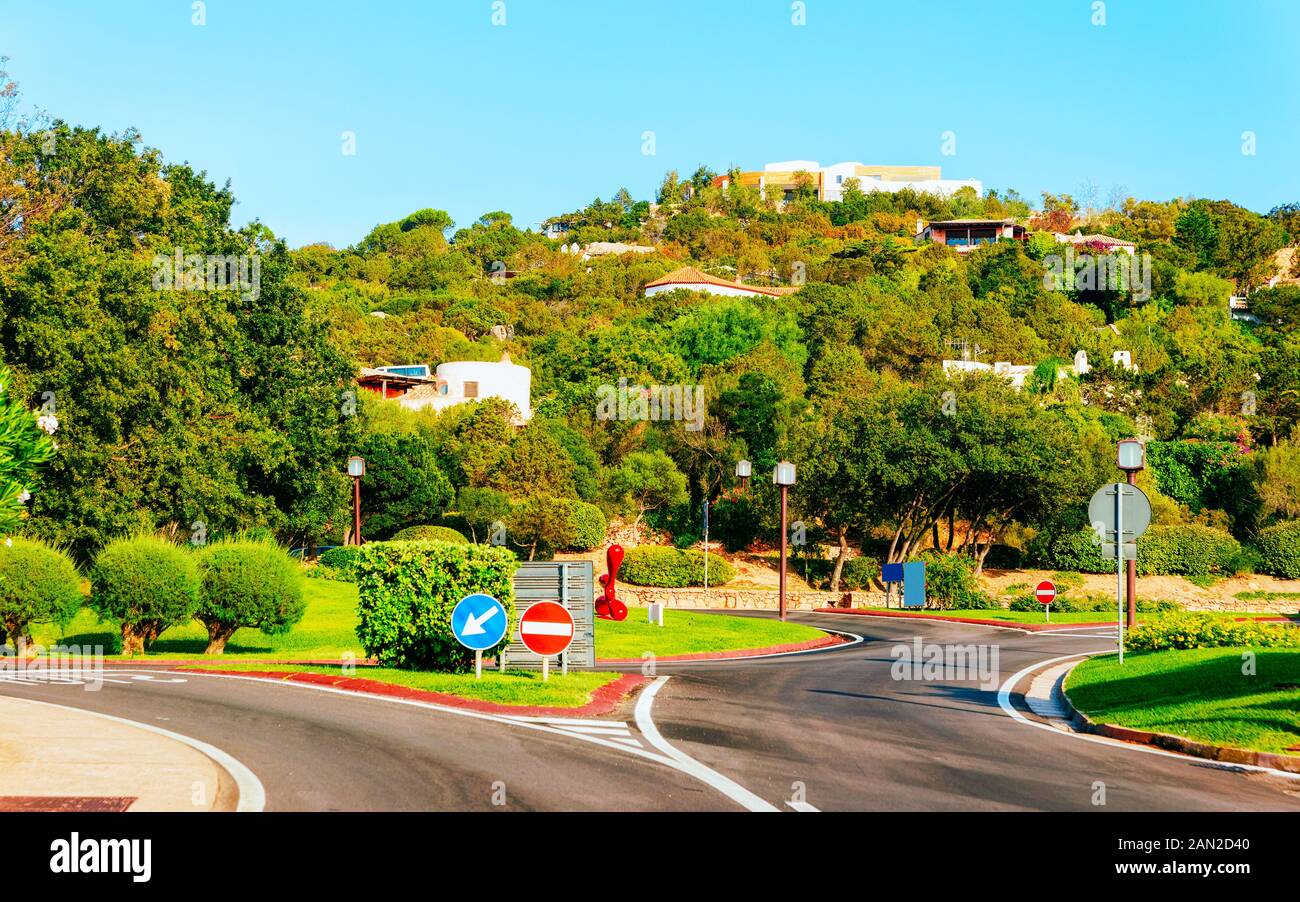 Empty road without cars at Porto Cervo reflex Stock Photo - Alamy