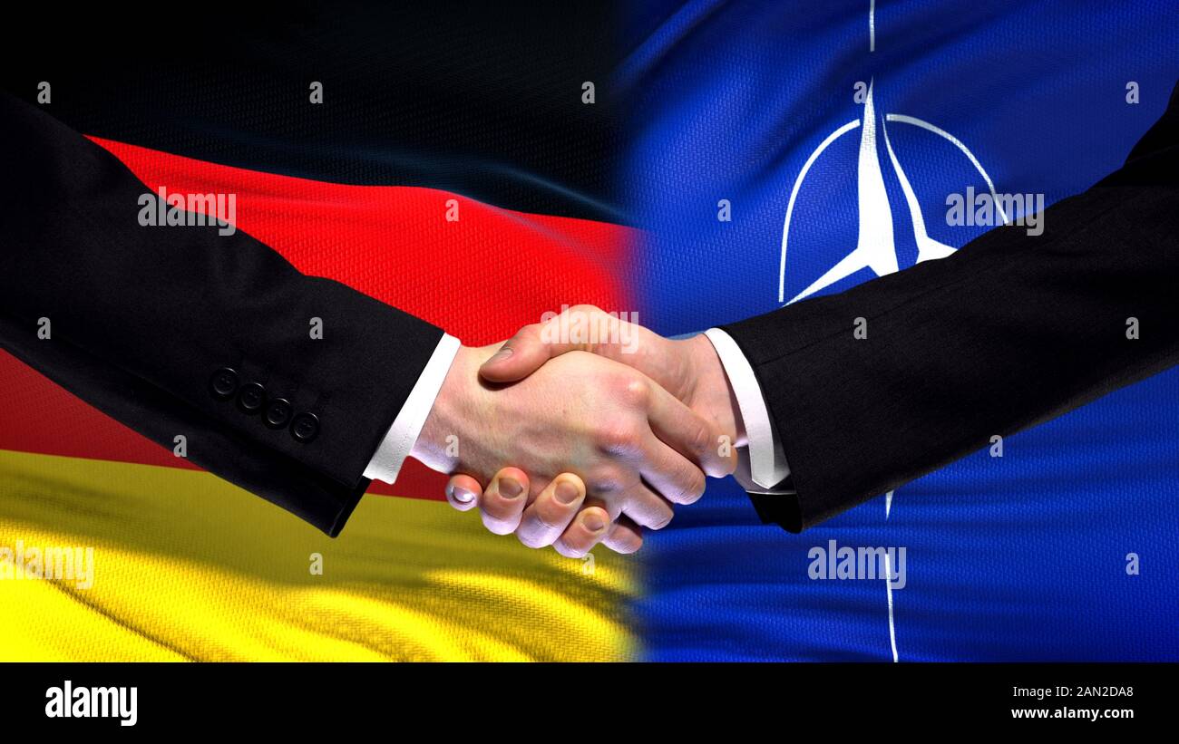 Germany and NATO handshake, international friendship relations, flag ...