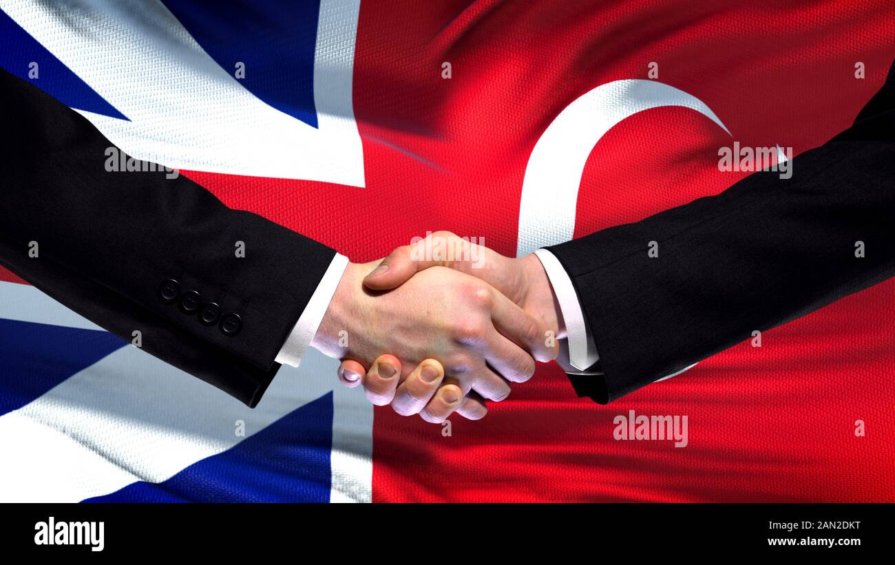 Great Britain and Turkey handshake, international friendship, flag ...