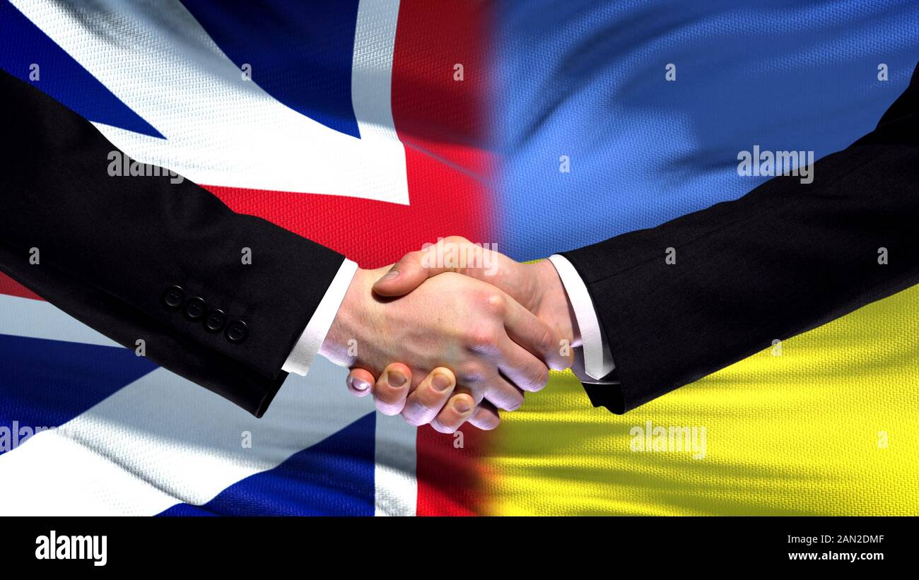 Great Britain and Ukraine handshake, international friendship, flag ...