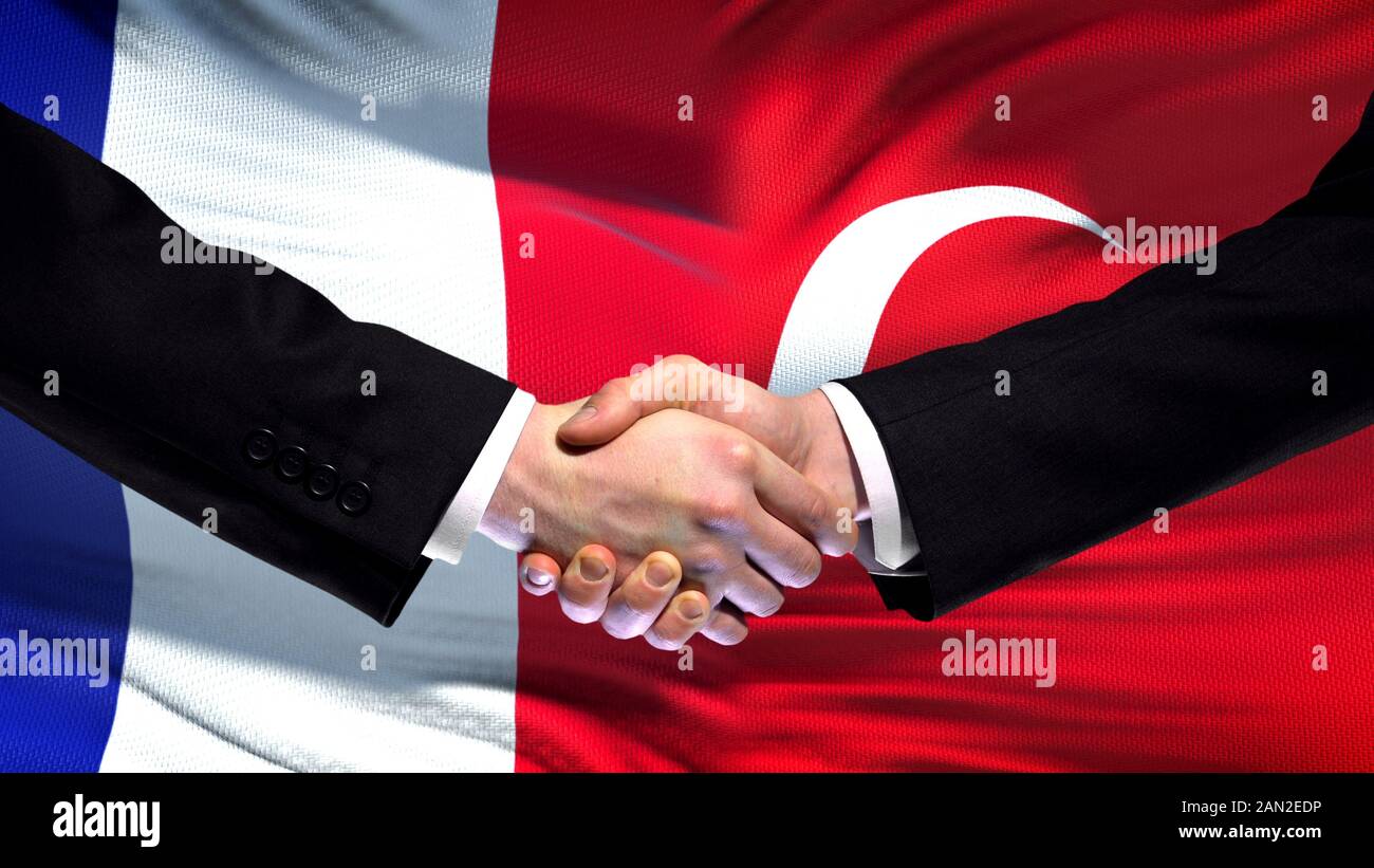 France and Turkey handshake, international friendship relations, flag ...