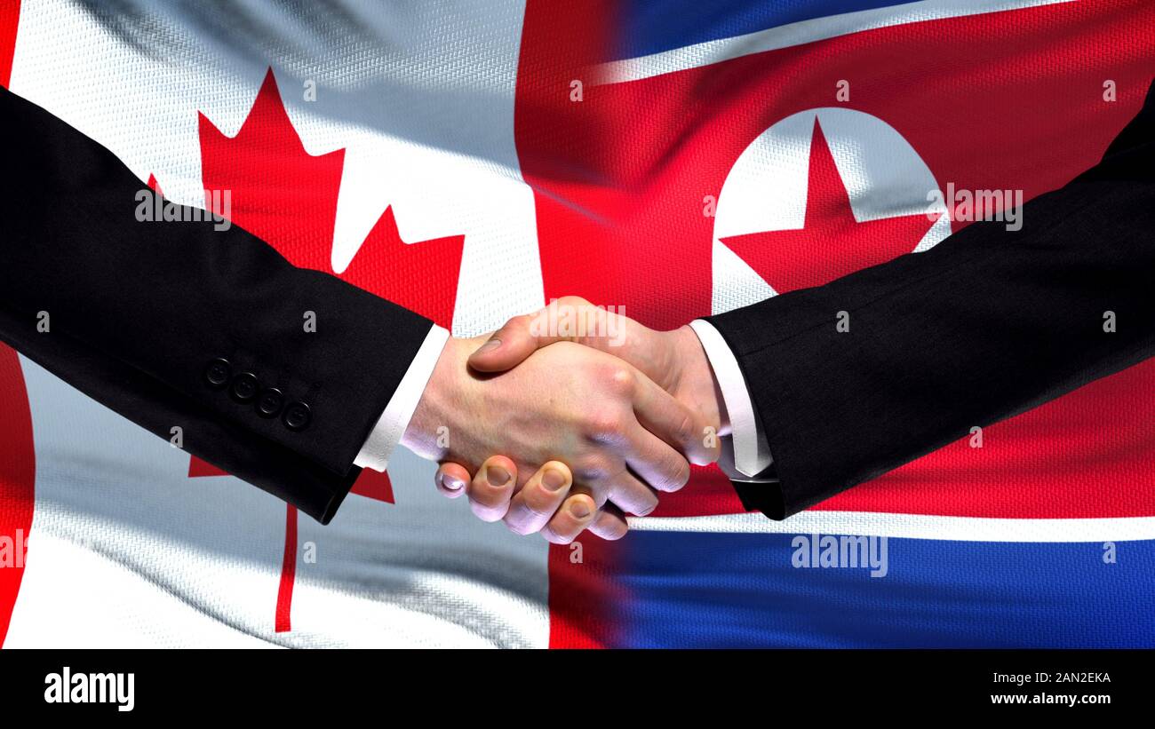 Canada and North Korea handshake, international friendship, flag ...