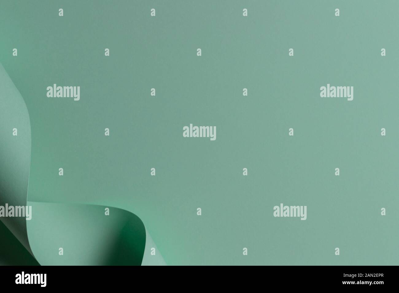 Abstract geometric shape green color paper background Stock Photo - Alamy