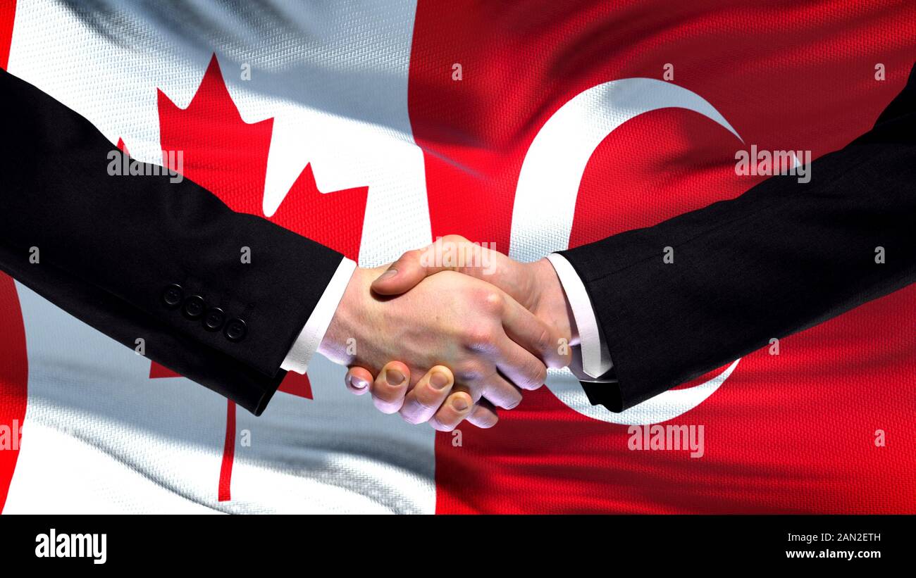 Canada and Turkey handshake, international friendship relations, flag ...