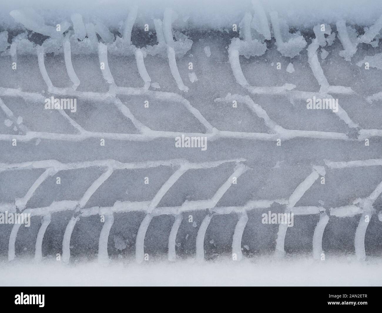 Car tyre print on the snow Stock Photo - Alamy
