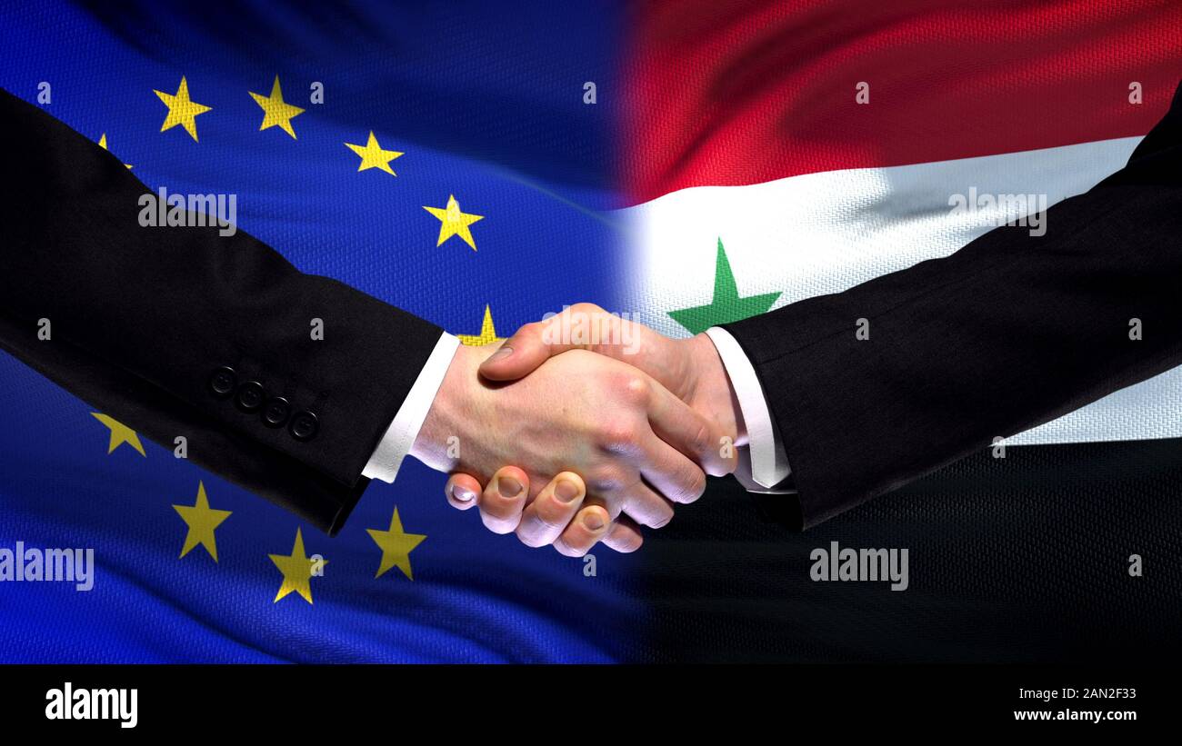 European Union and Syria handshake, international friendship, flag ...