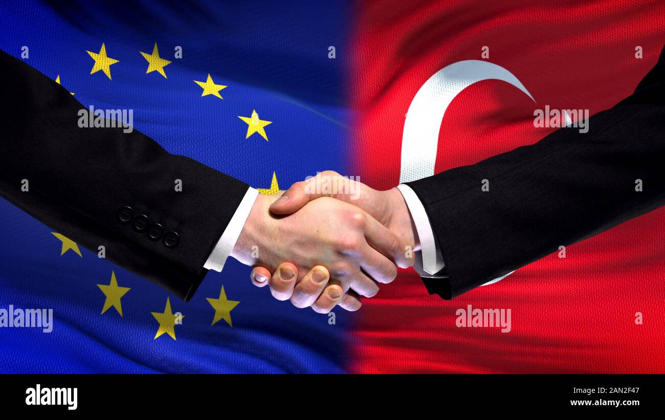 European Union and Turkey handshake, international friendship, flag ...