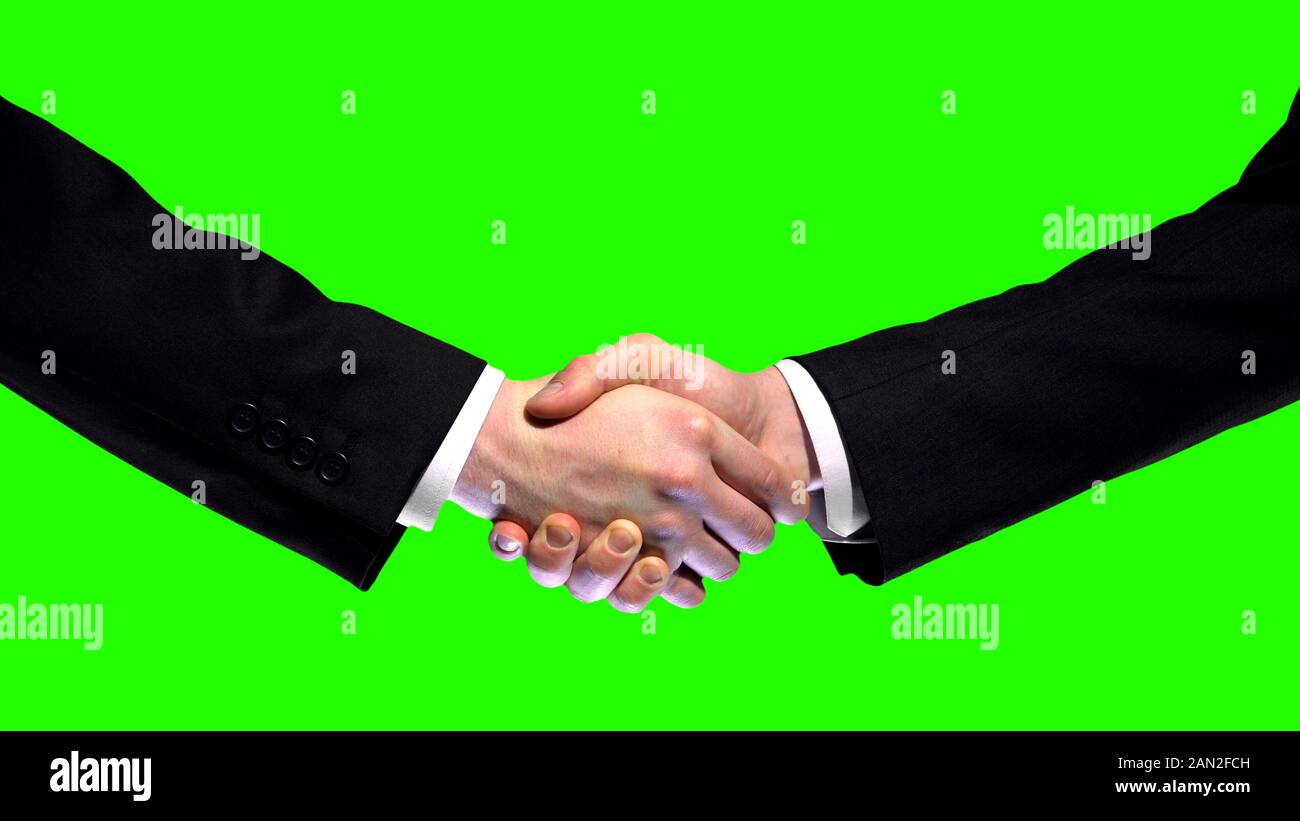 Business handshake on green screen background, partnership trust ...