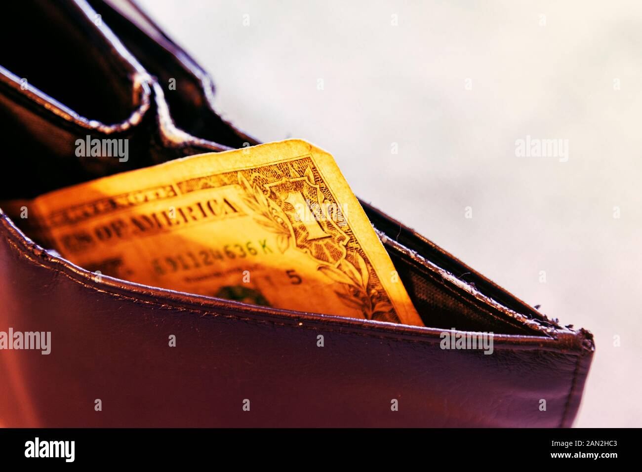 Empty male wallet with one dollar bill. financial wellness. copy space ...