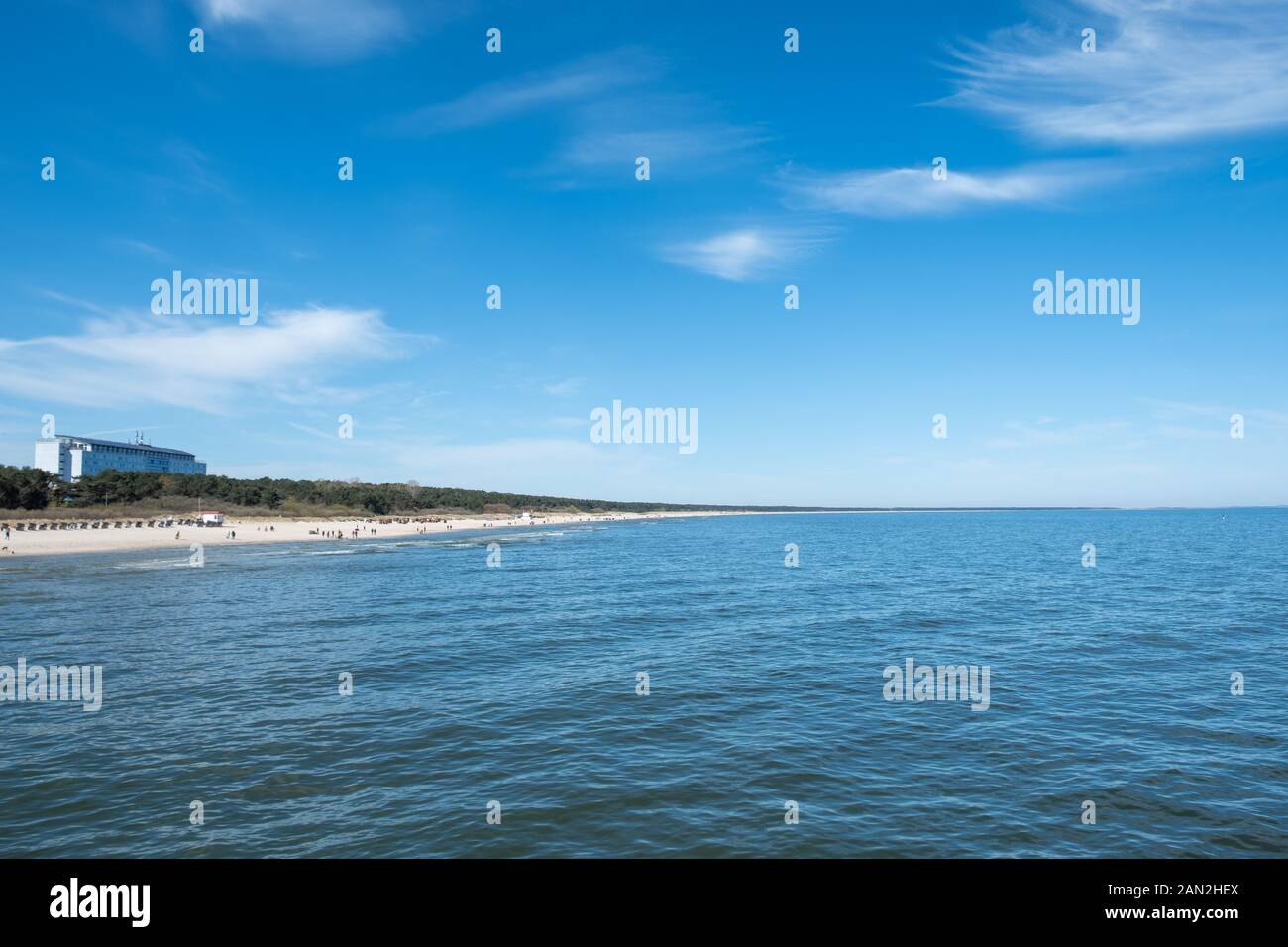 The beach of Zinnowitz on a sunny day. You see the Hotel Baltic Stock ...