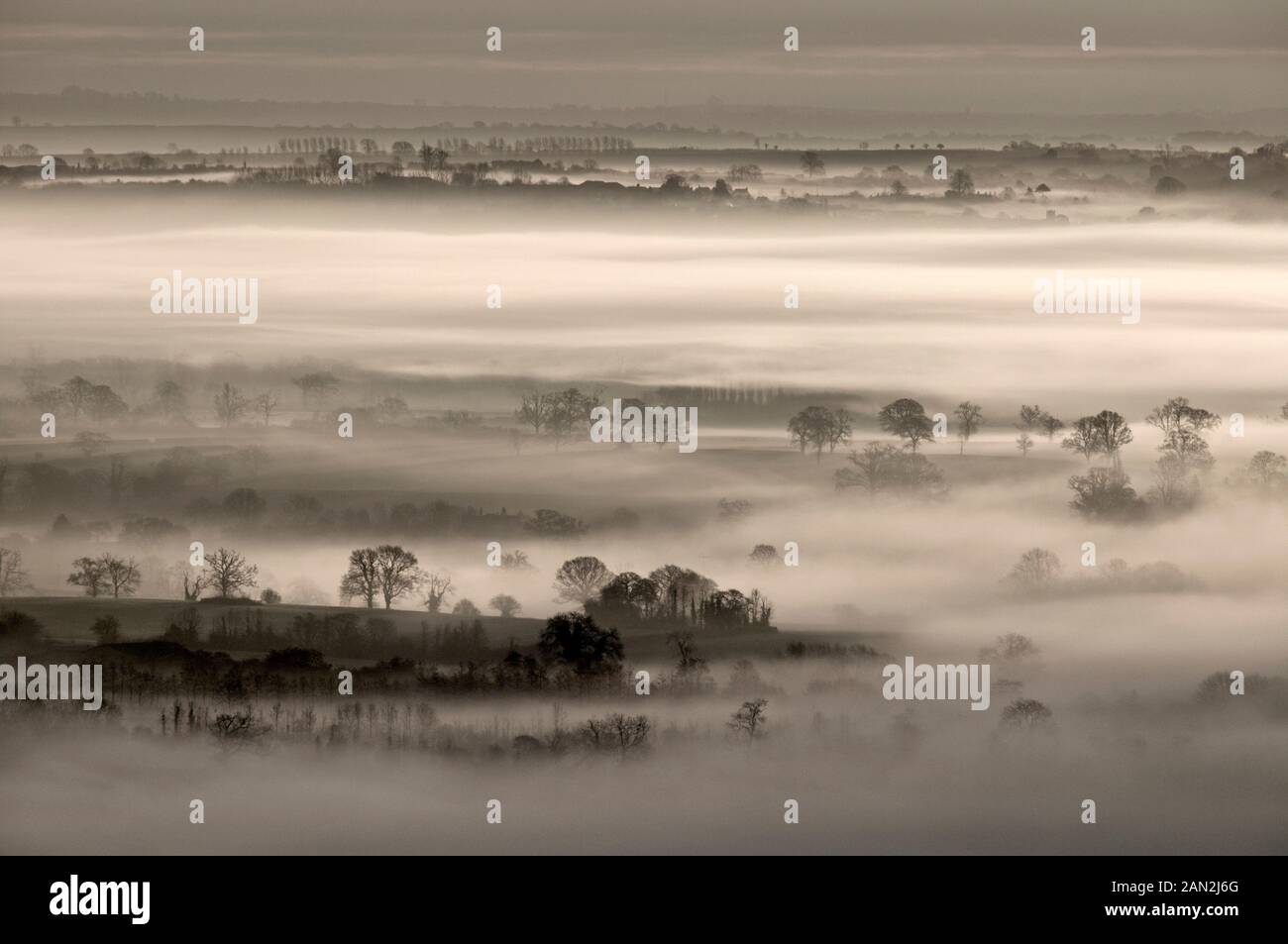 Misty morning from Glastonbury Tor across Kennard Moor, Somerset ...