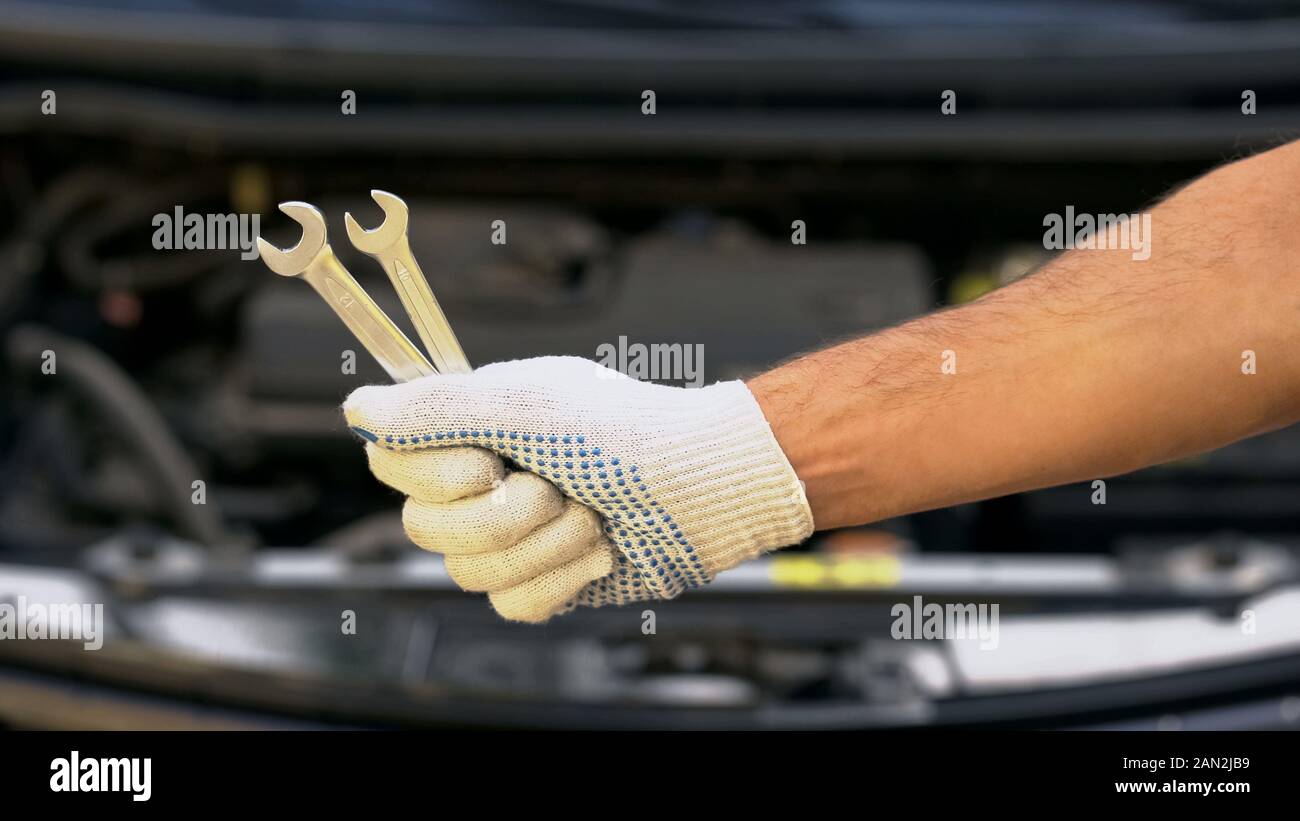 Spanners in hand hi-res stock photography and images - Alamy
