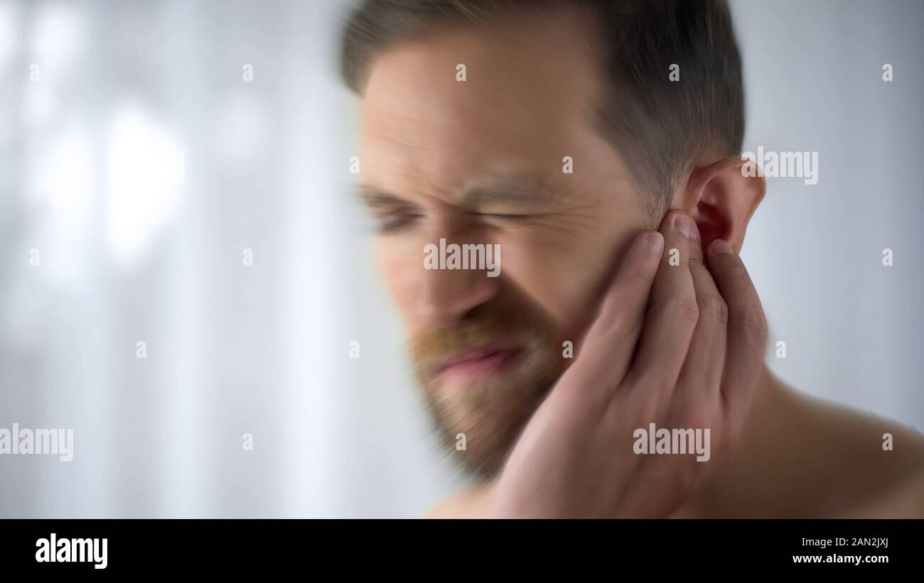 Man feels pain in middle ear, meningitis and hearing loss, inflammation ...