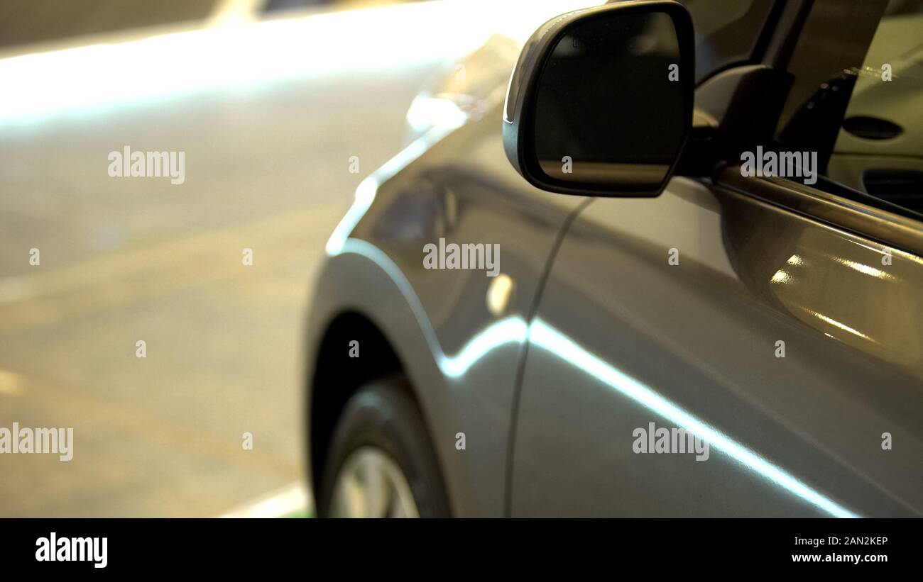 Shiny car on parking lot, automobile security, modern city transport ...