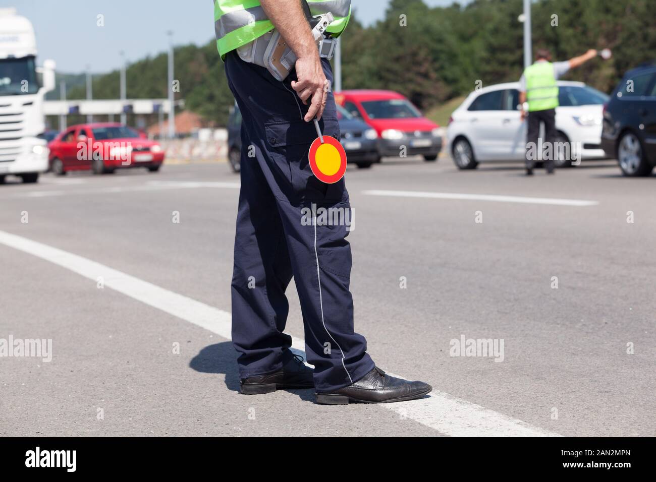 Policeman doing a traffic control Stock Photo - Alamy