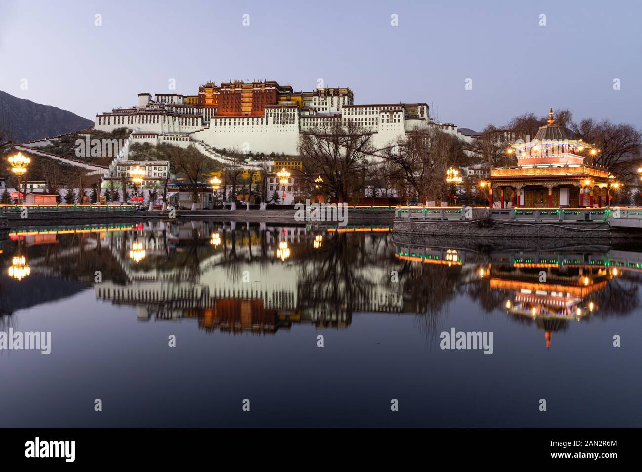 Stunning twilight over the famous Potala Palace in Lhasa old town in ...