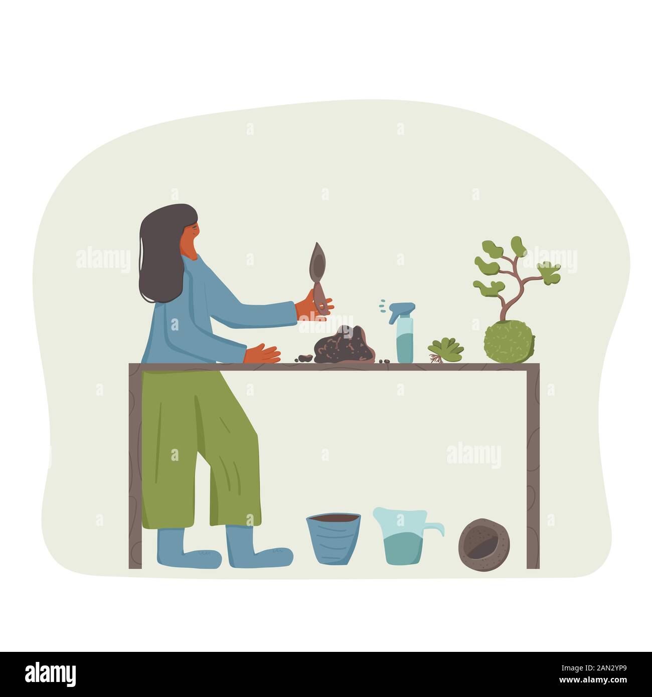 Floriculture. Brunette girl wearing in cozy clothes making kokedama ...