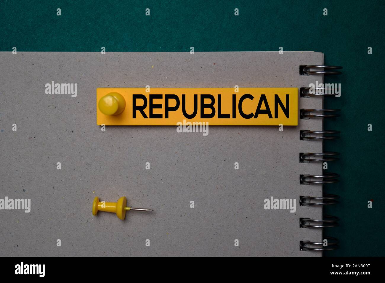 Republican write on a sticky note isolated on green background Stock ...