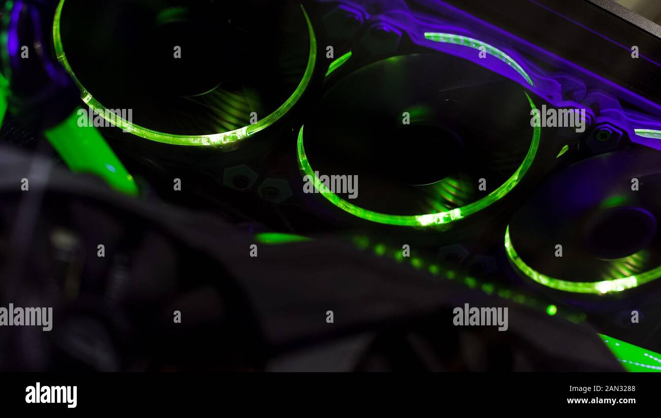 Computer fans illuminated with neon light, high-end technologies, gamer ...