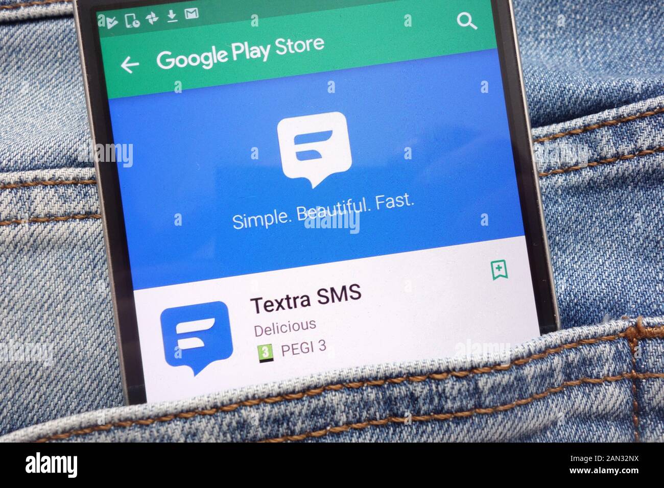 Textra SMS app on Google Play Store website displayed on smartphone ...