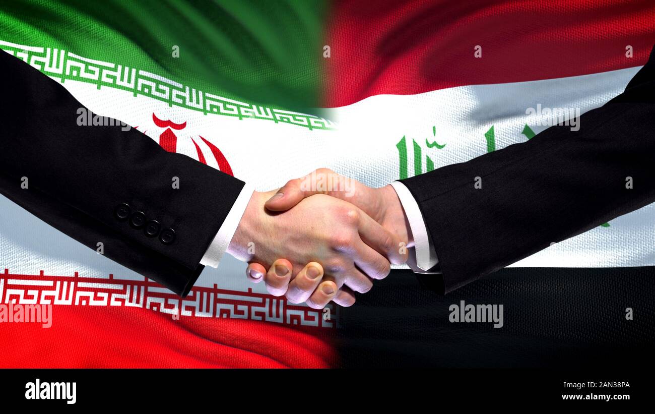 Iran and Iraq handshake, international friendship relations, flag ...