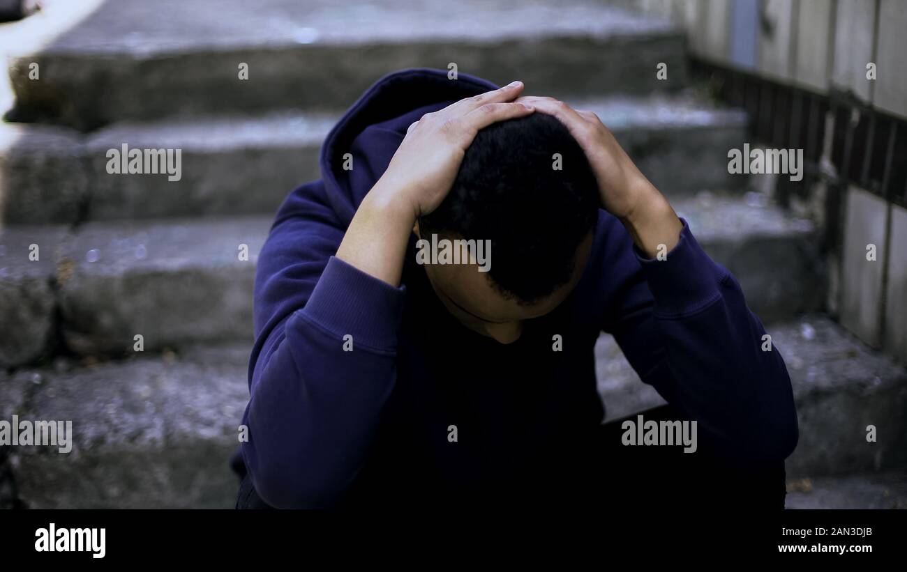 African american boy became orphan, feeling pain of loss and fear for ...