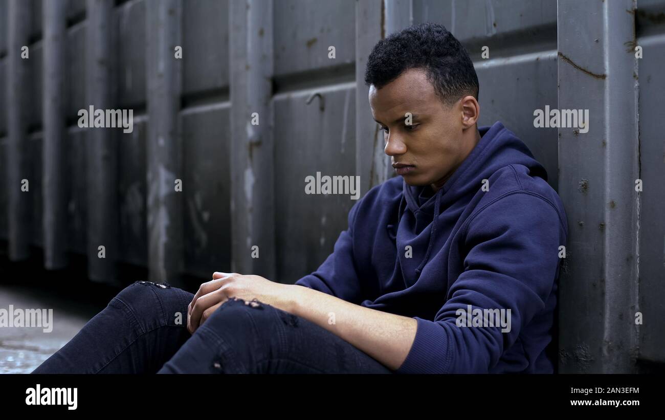 Social problems, african-american homeless boy feeling loneliness ...