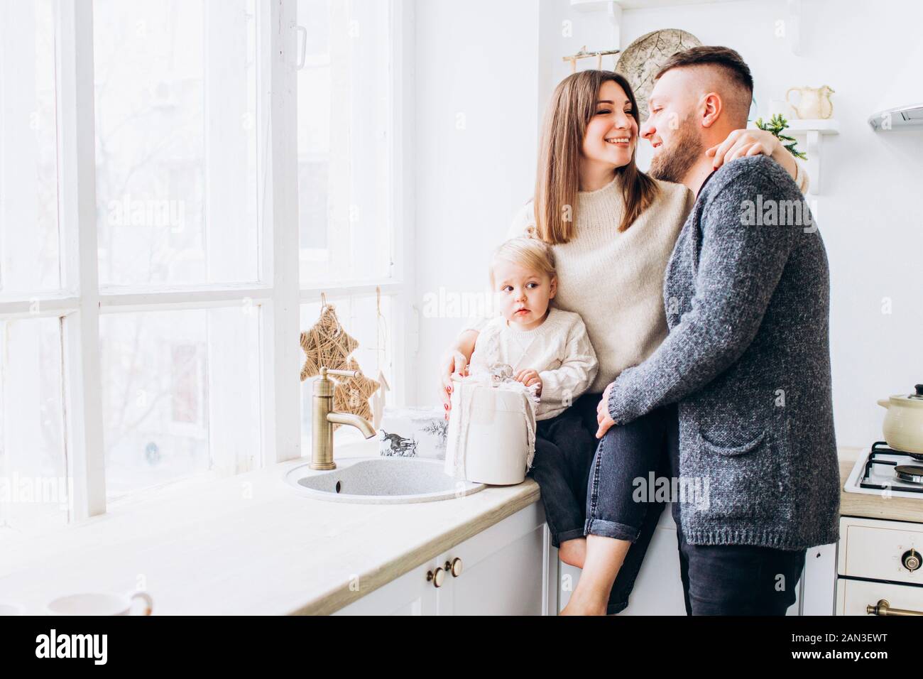 Happy family in a bright kitchen. Happy childhood Stock Photo - Alamy