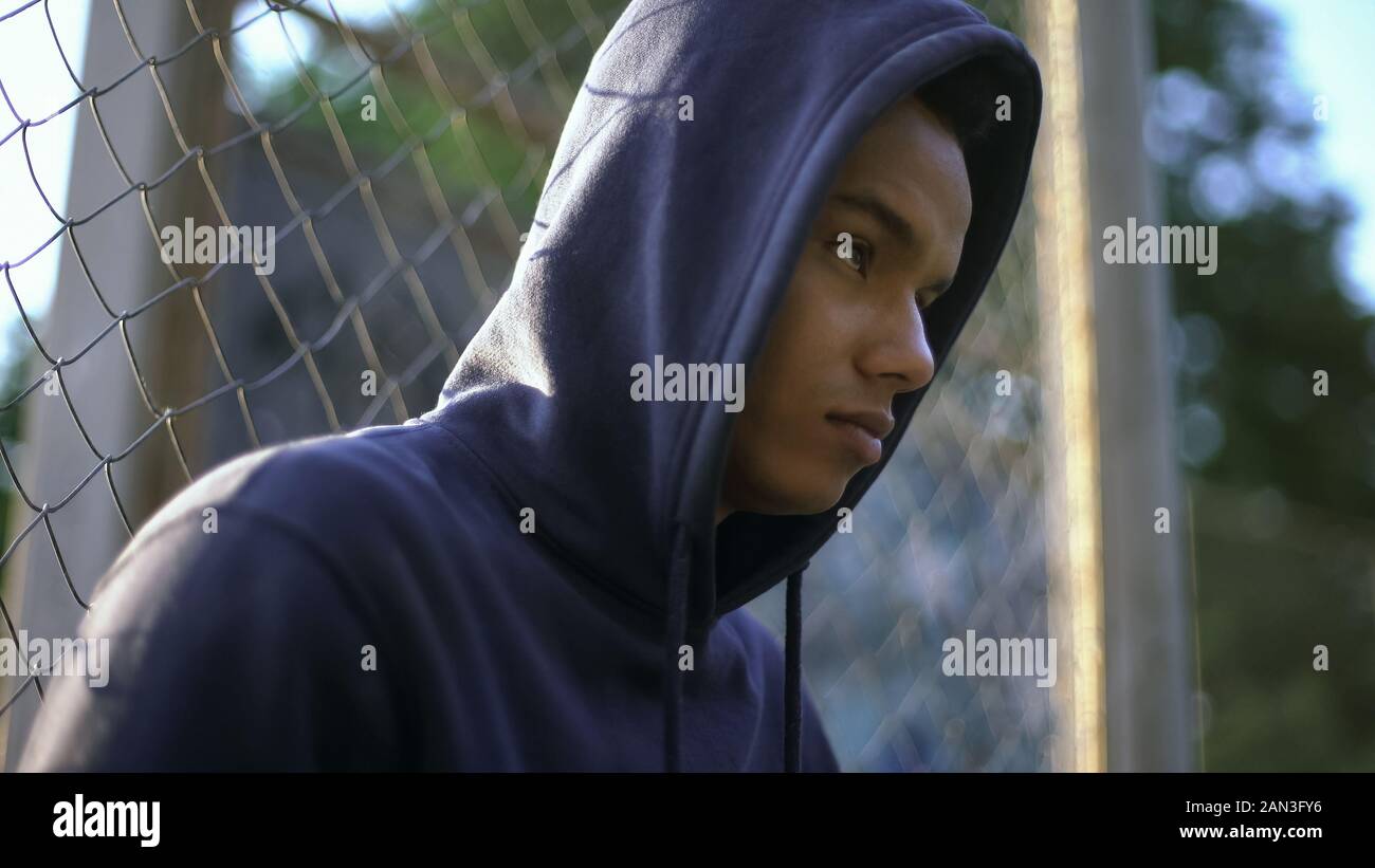 Aggressive afro-american teen ready to commit crime, lack of proper ...