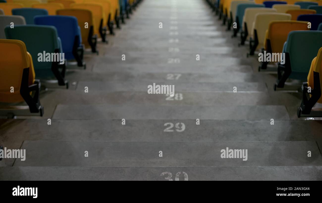 Numbered stairs with seating places, sport stadium tribune or concert ...