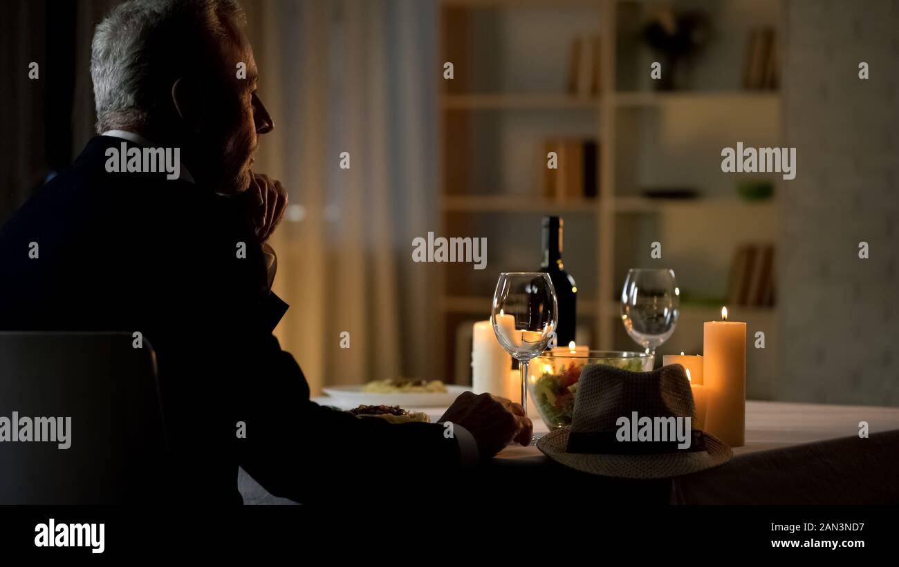 Old retired man waiting meal hi-res stock photography and images - Alamy