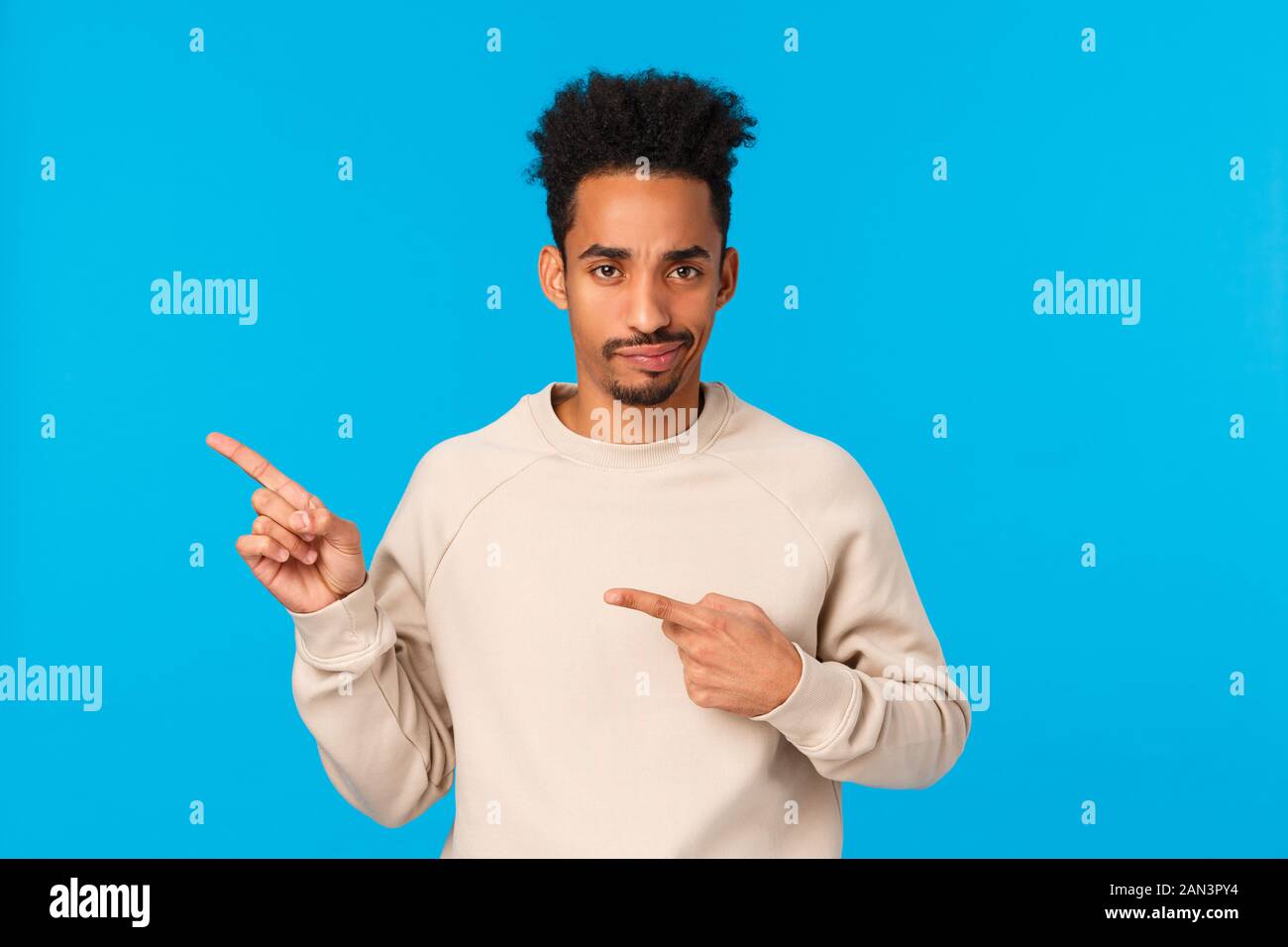Skeptical, serious-looking and disappointed african-american modern ...