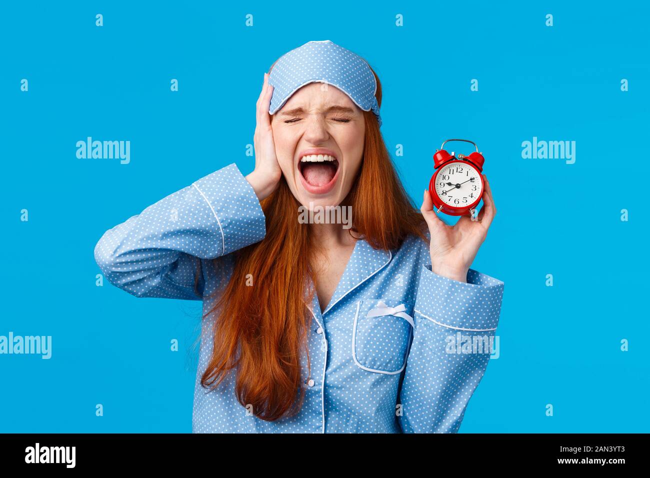 Upset and distressed screaming redhead lovely girl feeling bothered and ...