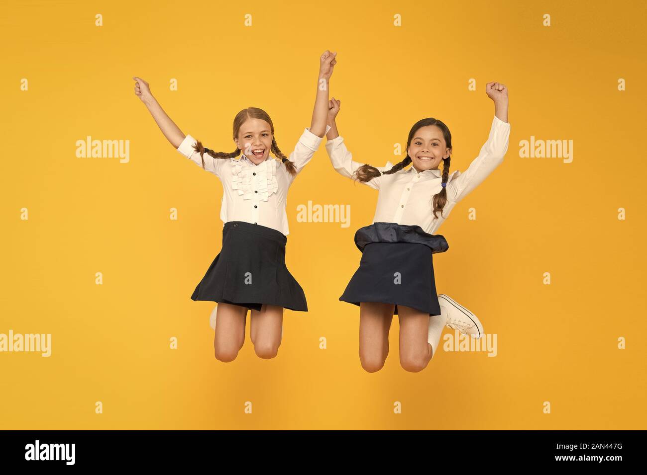 Classmates having fun at school Friends adorable pupils. Schoolgirls ...