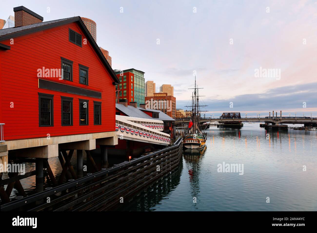 Boston Harbor at sunrise viewing from Fan Pier Park. Boston Harbor is a ...