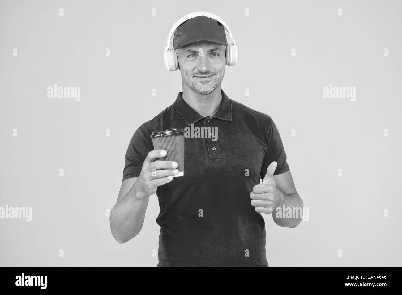 Here is your coffee. Cafe operator cashier hold coffee cup. Have a nice ...