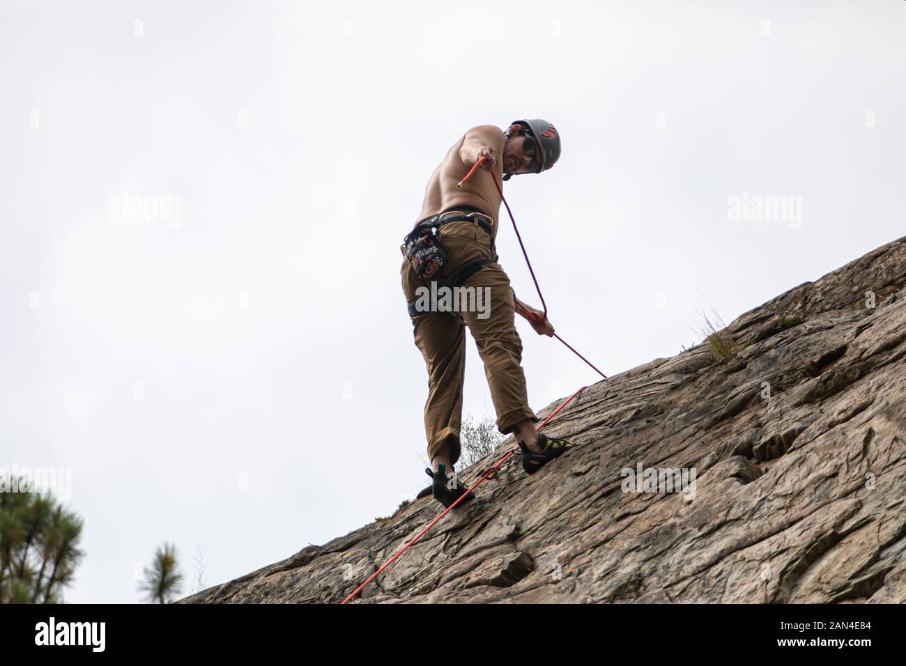 Climbing top cliff angle hi-res stock photography and images - Alamy