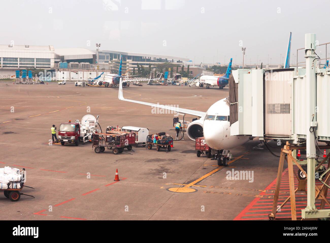 Picture of Boeing 737-800NG of Sriwijaya Air Preparing for Boarding ...