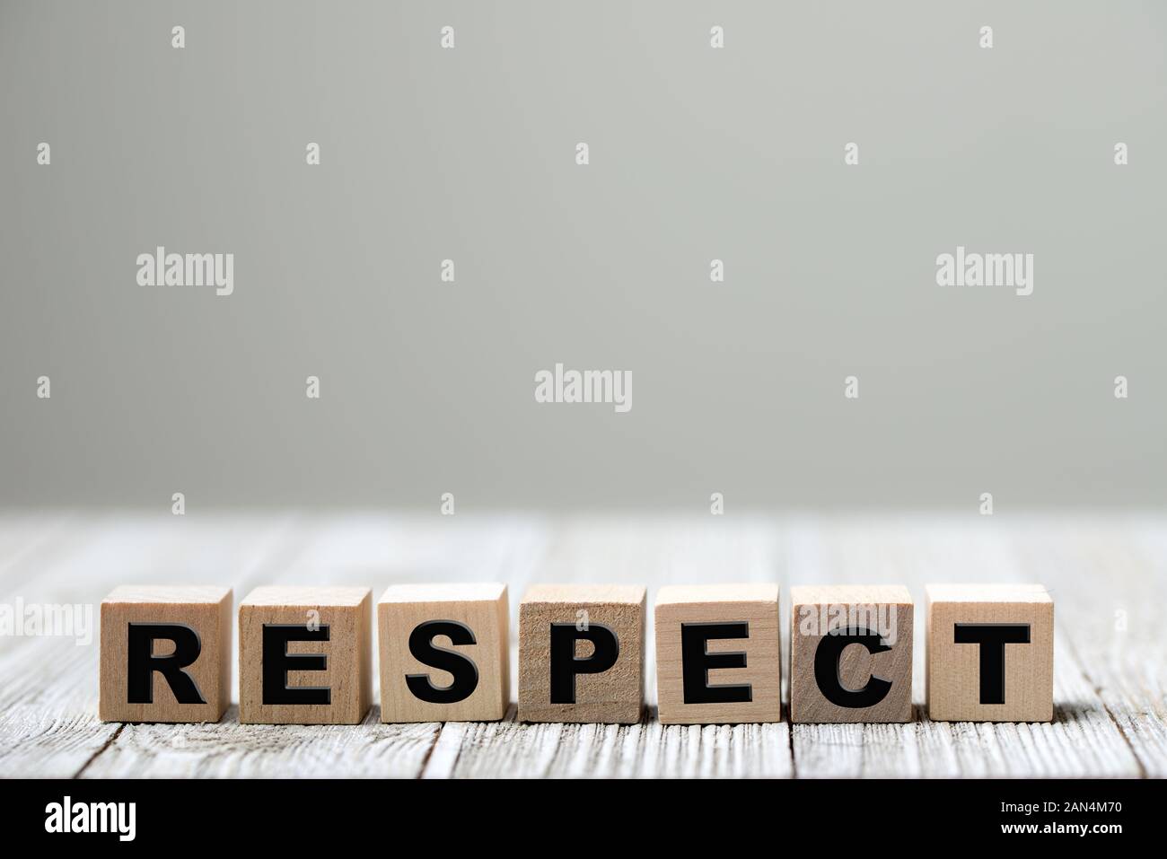 Respect word written on wood block Stock Photo - Alamy