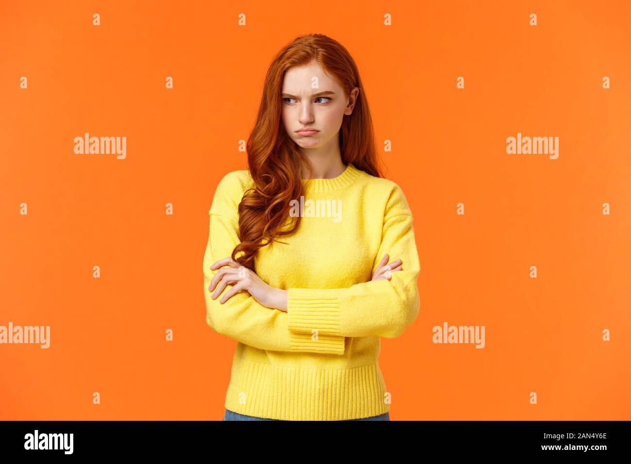 Offended angry and tensed woman with curly red hair, freckles, having ...