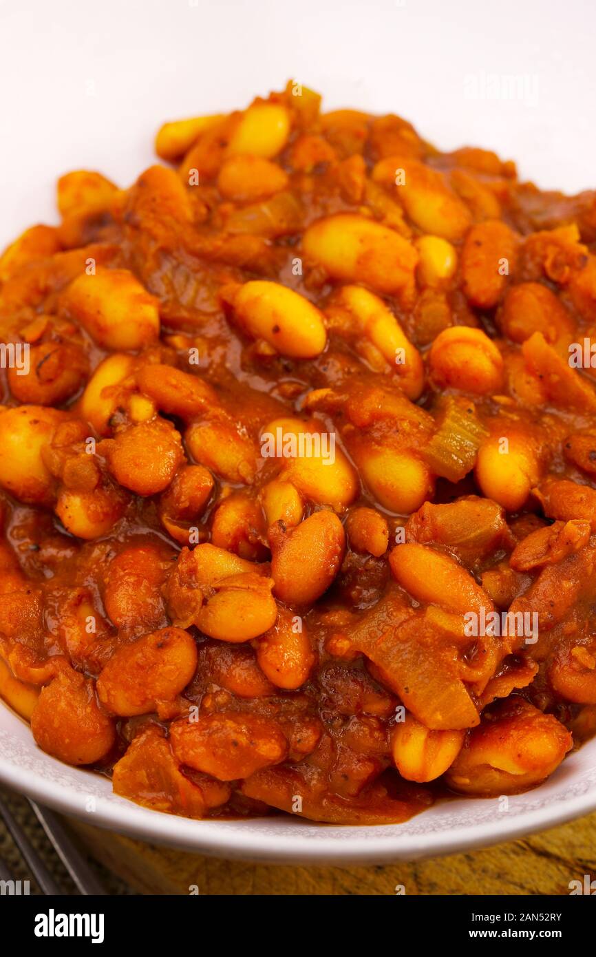 Macro photograph of healthy dish of baked beans, hot and ready to eat ...