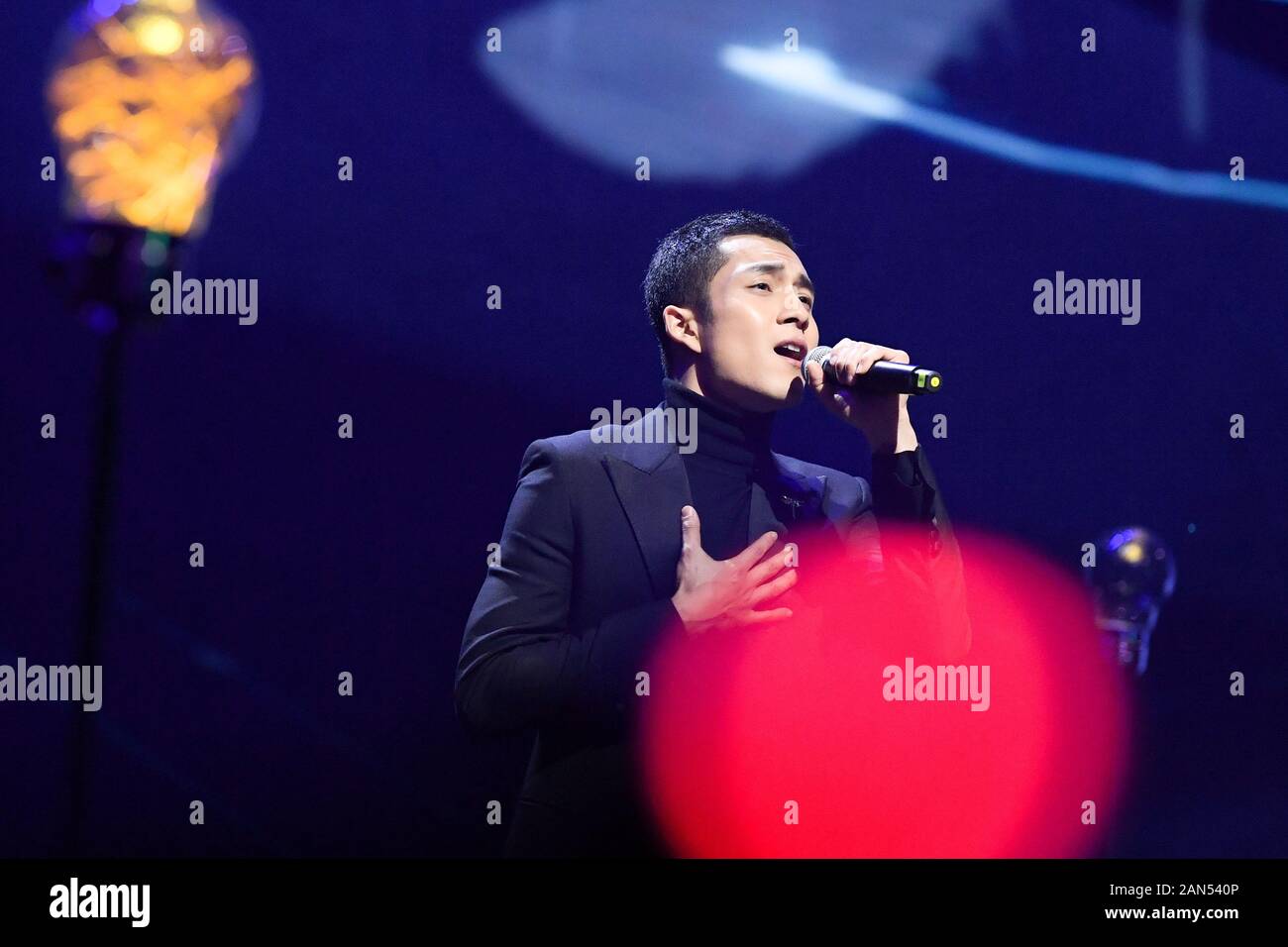 --FILE--Chinese actor Han Dongjun, also known as Elvis Han, sings at ...