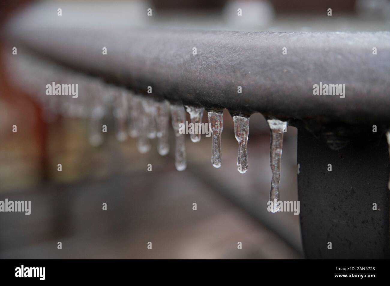 icicles on a railing Stock Photo - Alamy
