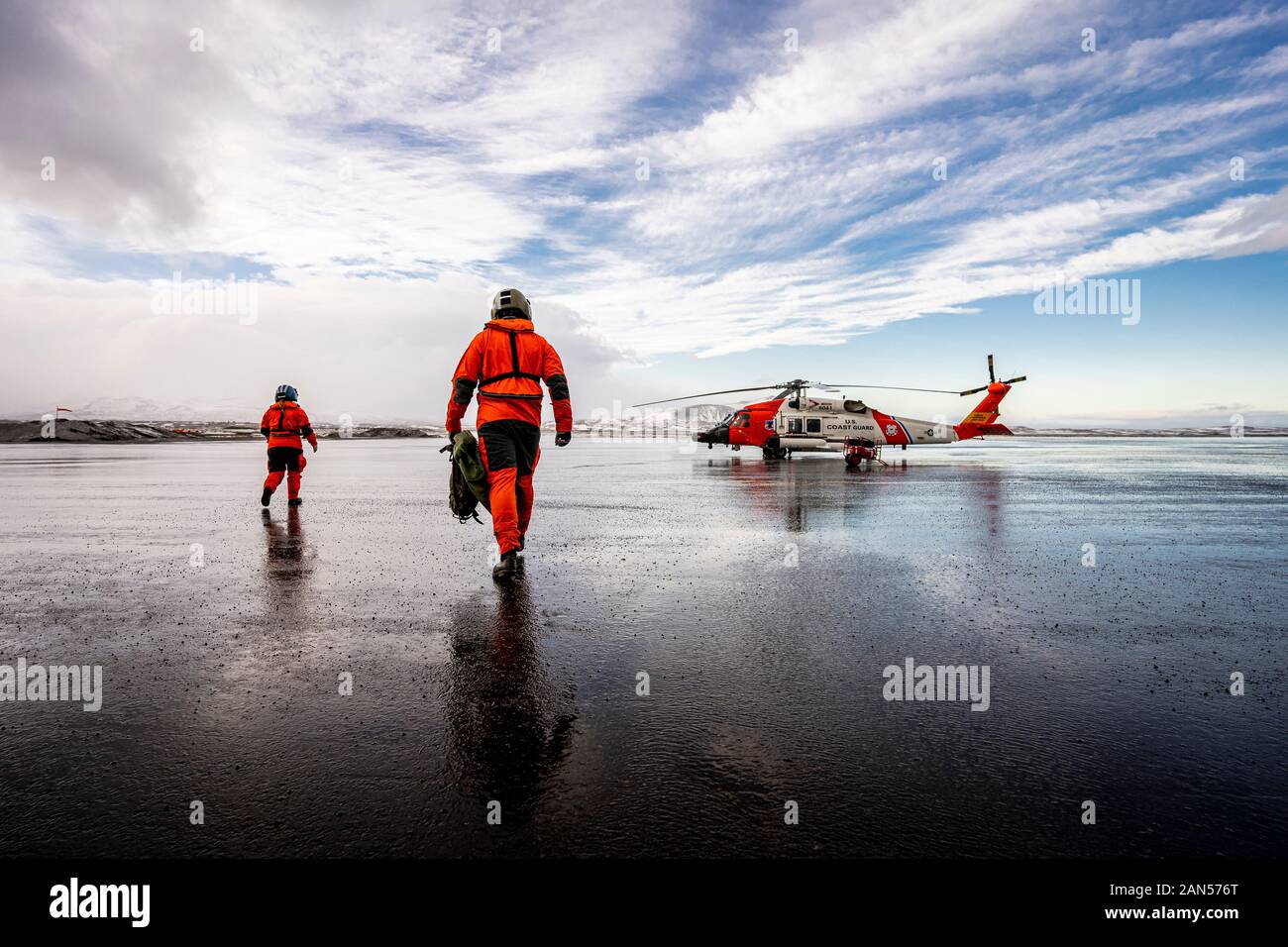 Coast Guard Base Kodiak Aids to Navigation (ATON) service members walk ...
