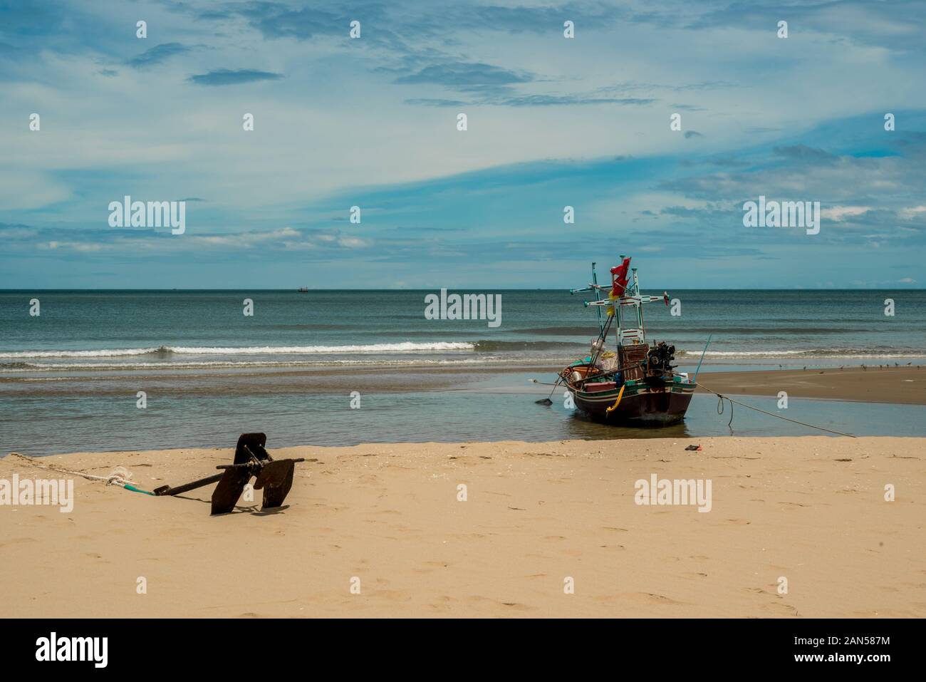 Traditional Thai ishing boats at the beach in Pak Nam Pram, Thailand ...