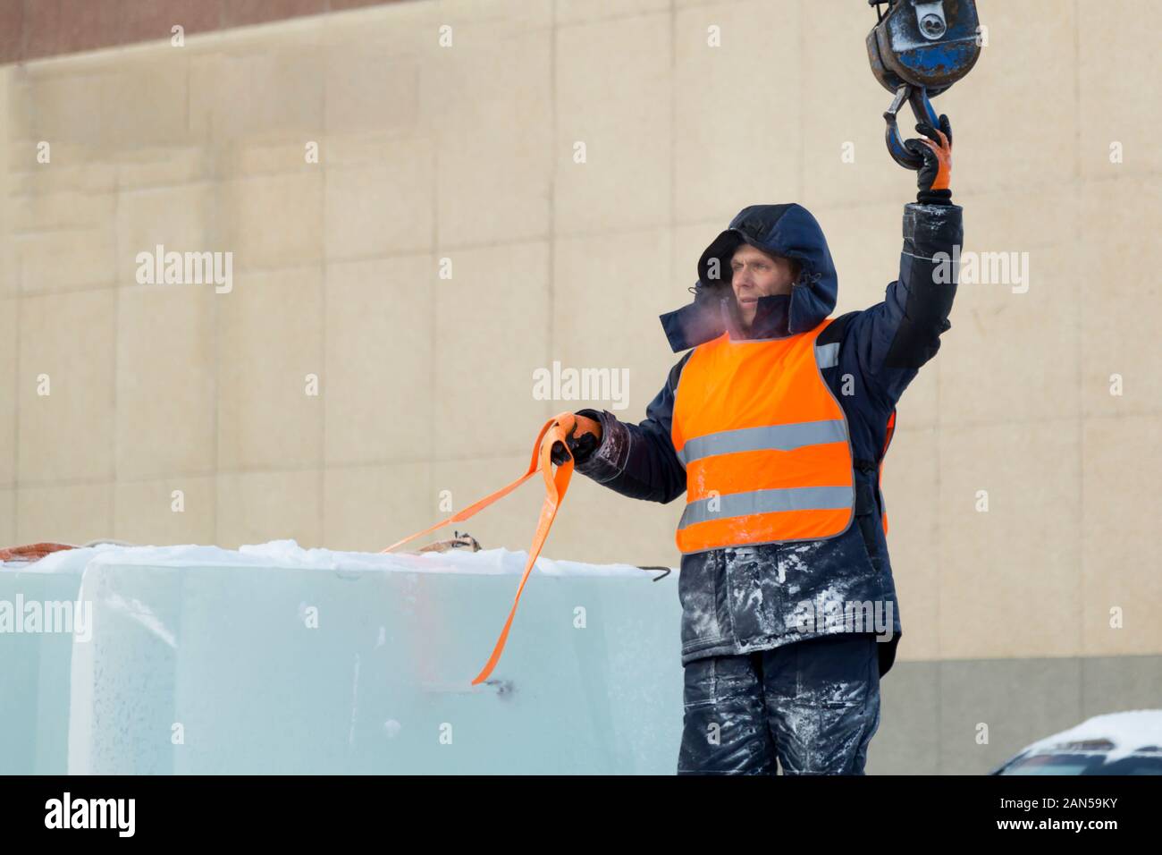 Portrait of installer at unloading ice blocks Stock Photo - Alamy