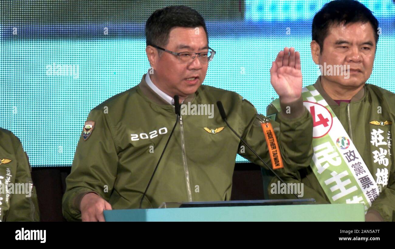 A Democratic Progressive Party (DPP) membes speak on stage during a ...