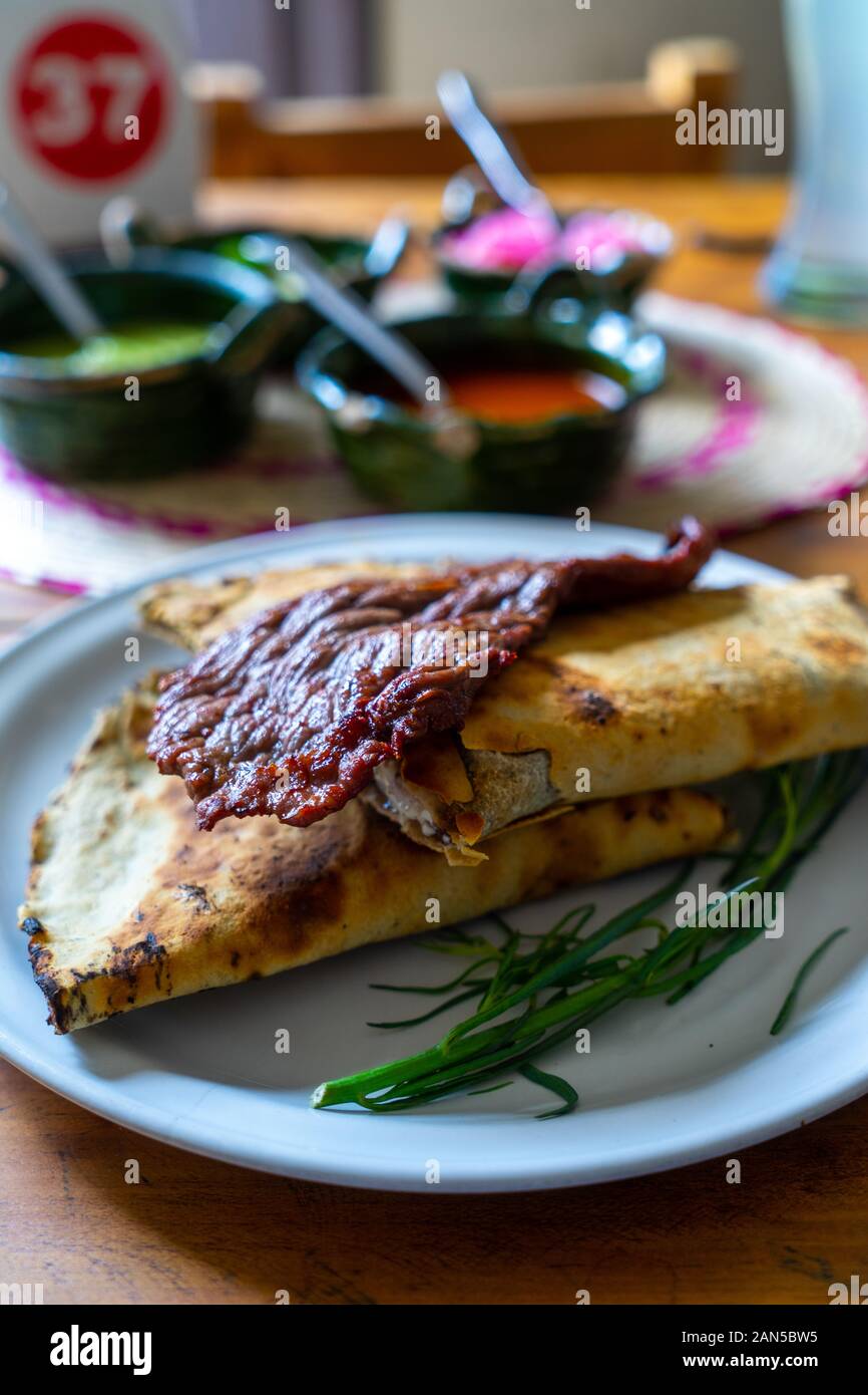 Mexican Traditional Food "Tlayuda" in Oaxaca, Mexico Stock Photo - Alamy