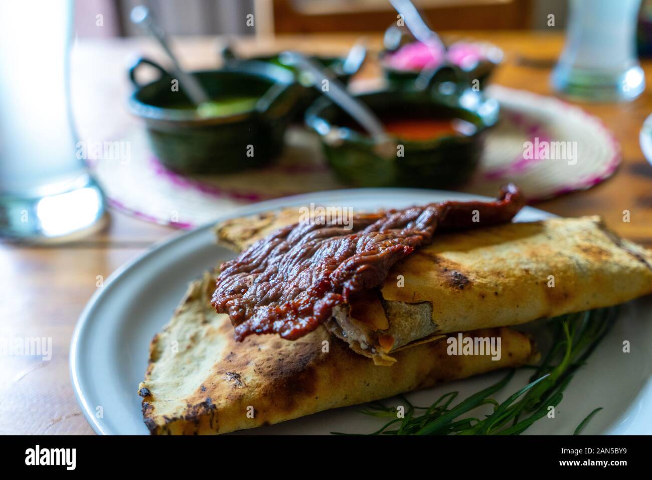 Mexican Traditional Food "Tlayuda" in Oaxaca, Mexico Stock Photo - Alamy